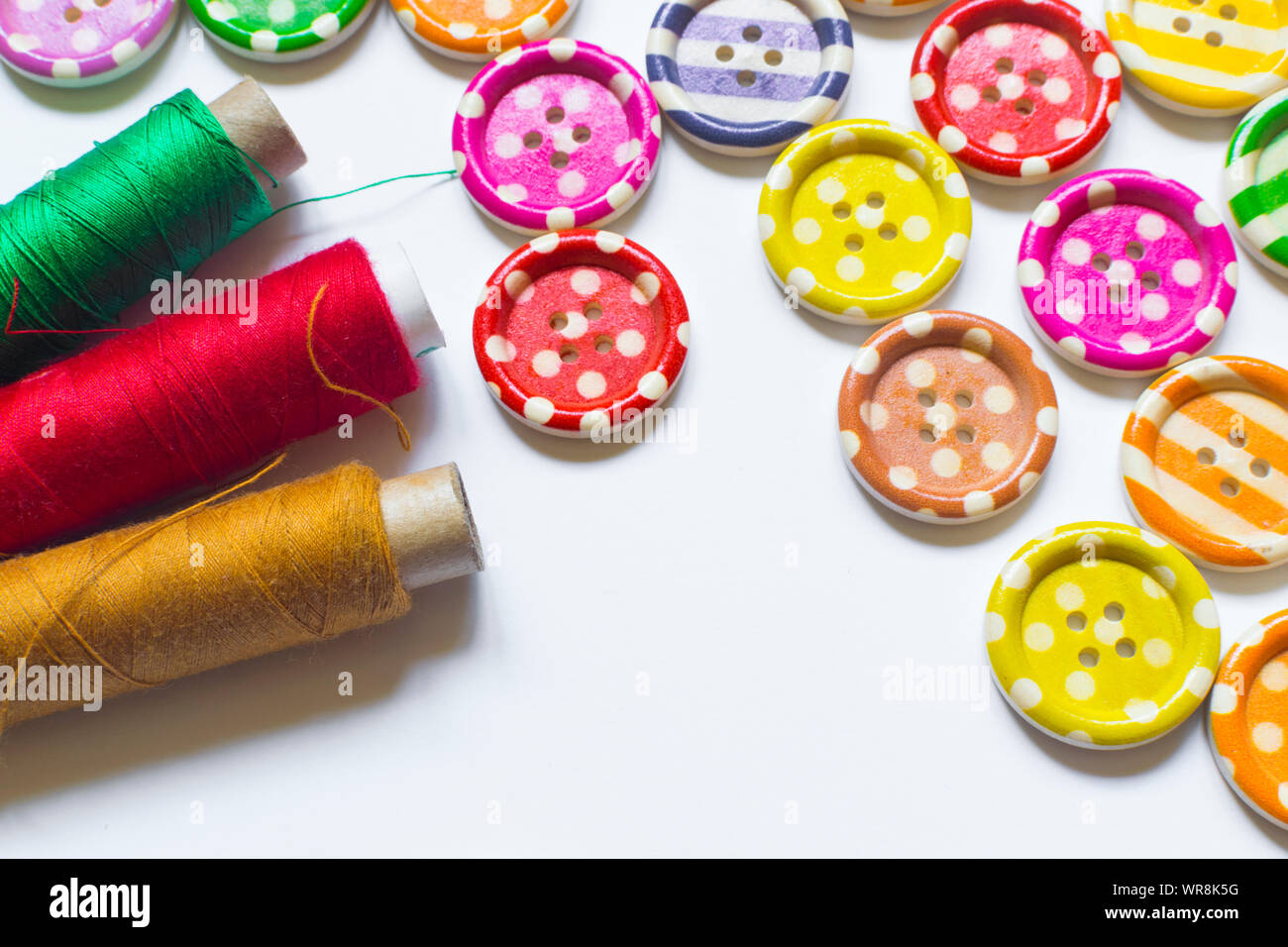 .Various sewing buttons isolated on white background Stock Photo - Alamy