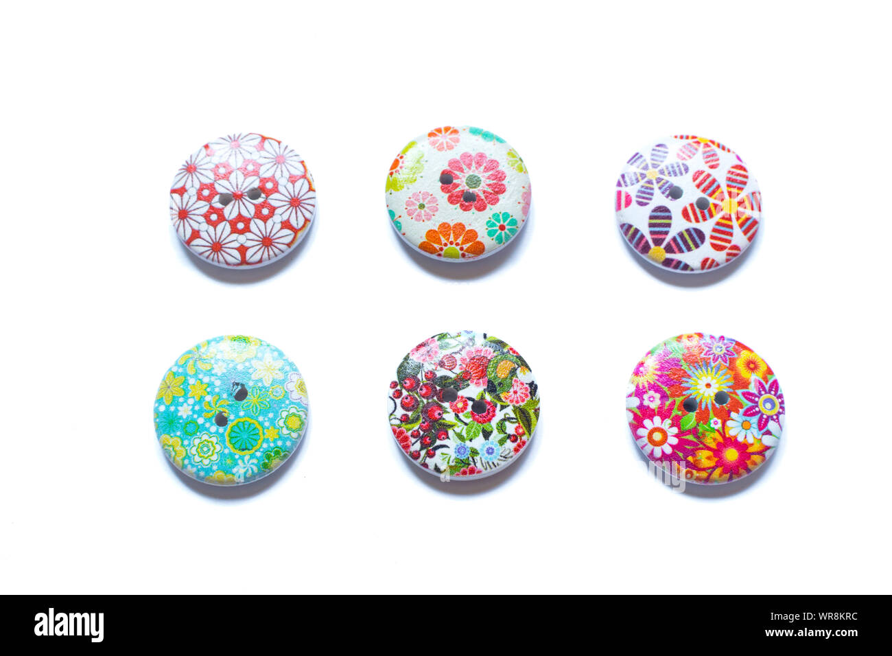 .Various sewing buttons isolated on white background Stock Photo - Alamy