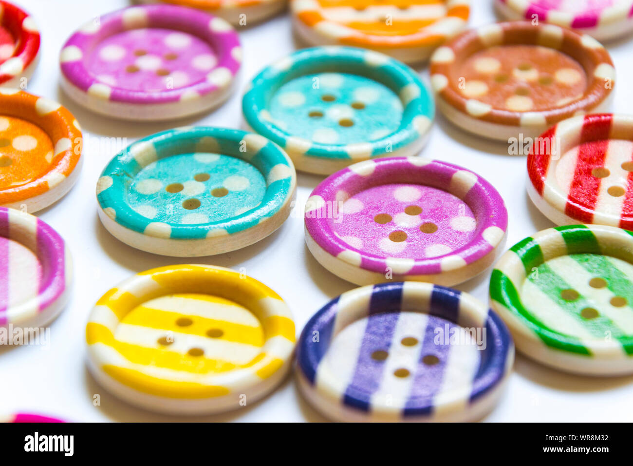 .Various sewing buttons isolated on white background Stock Photo - Alamy
