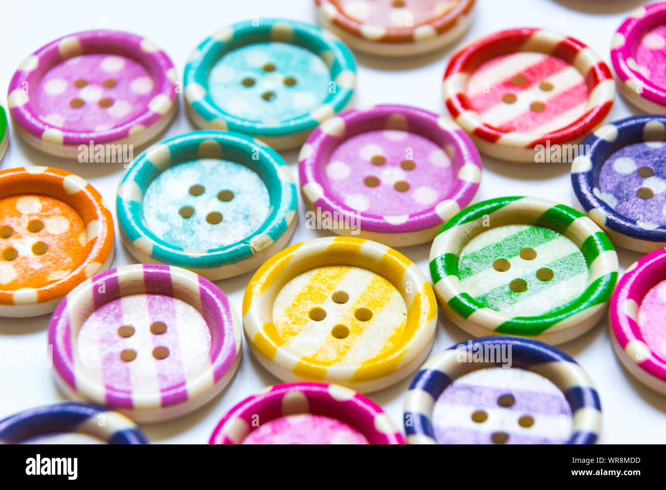 .Various sewing buttons isolated on white background Stock Photo - Alamy