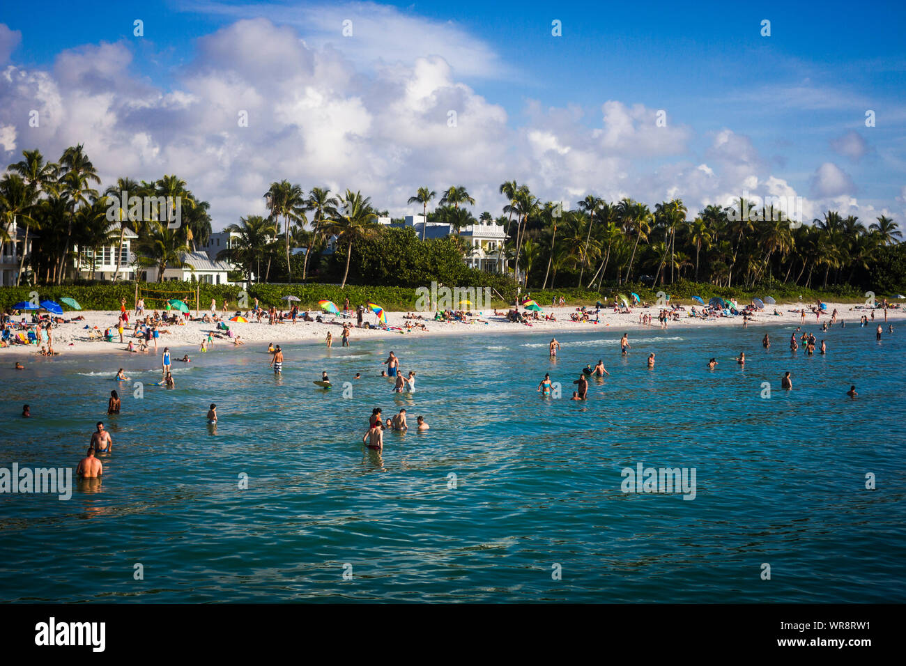 People enjoying the seaside in Naples, Florida, USA Stock Photo - Alamy