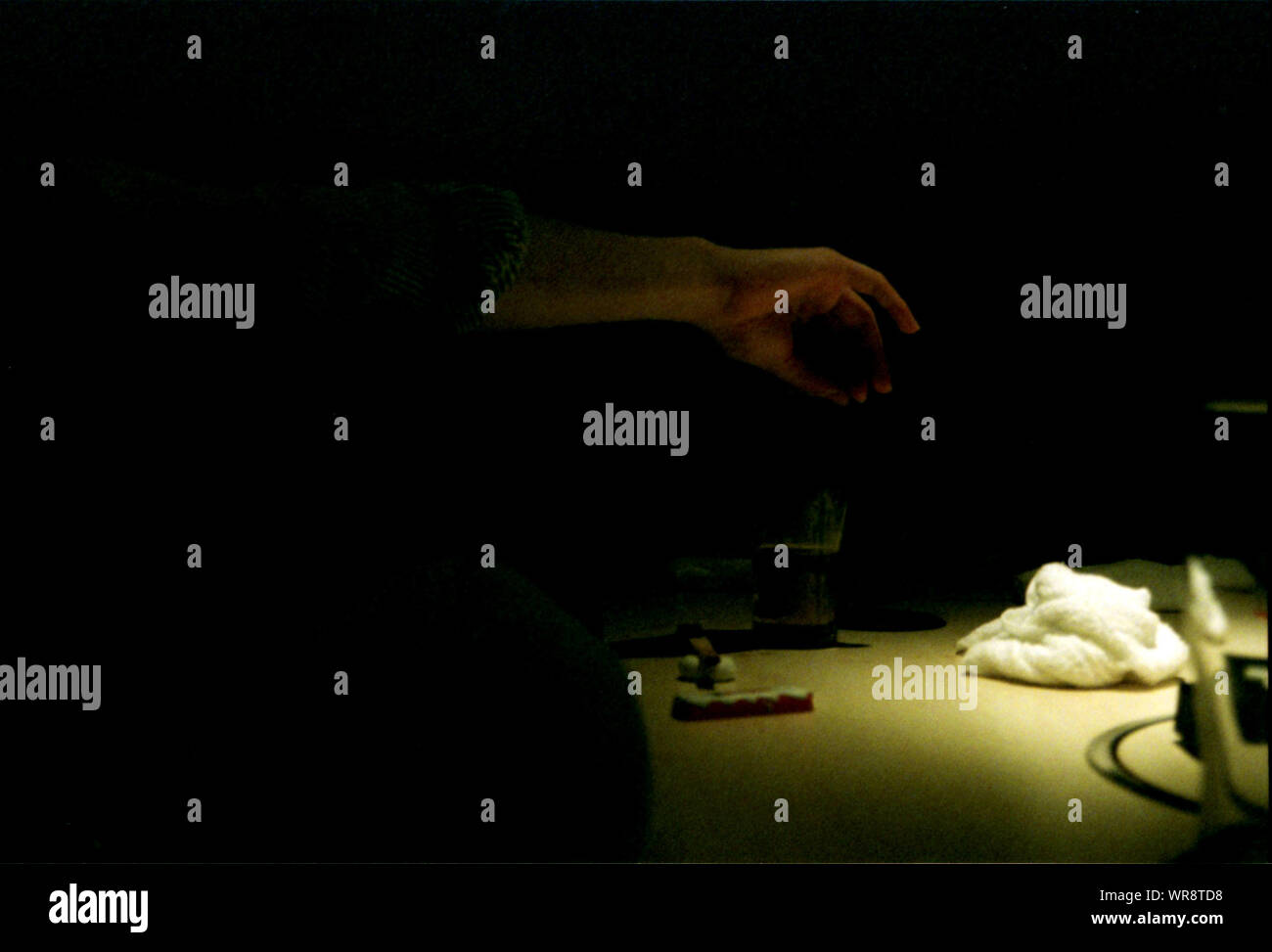 Hand in hand dark hi-res stock photography and images - Alamy