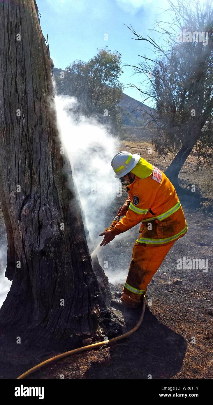 Extinguishing hi-res stock photography and images - Alamy