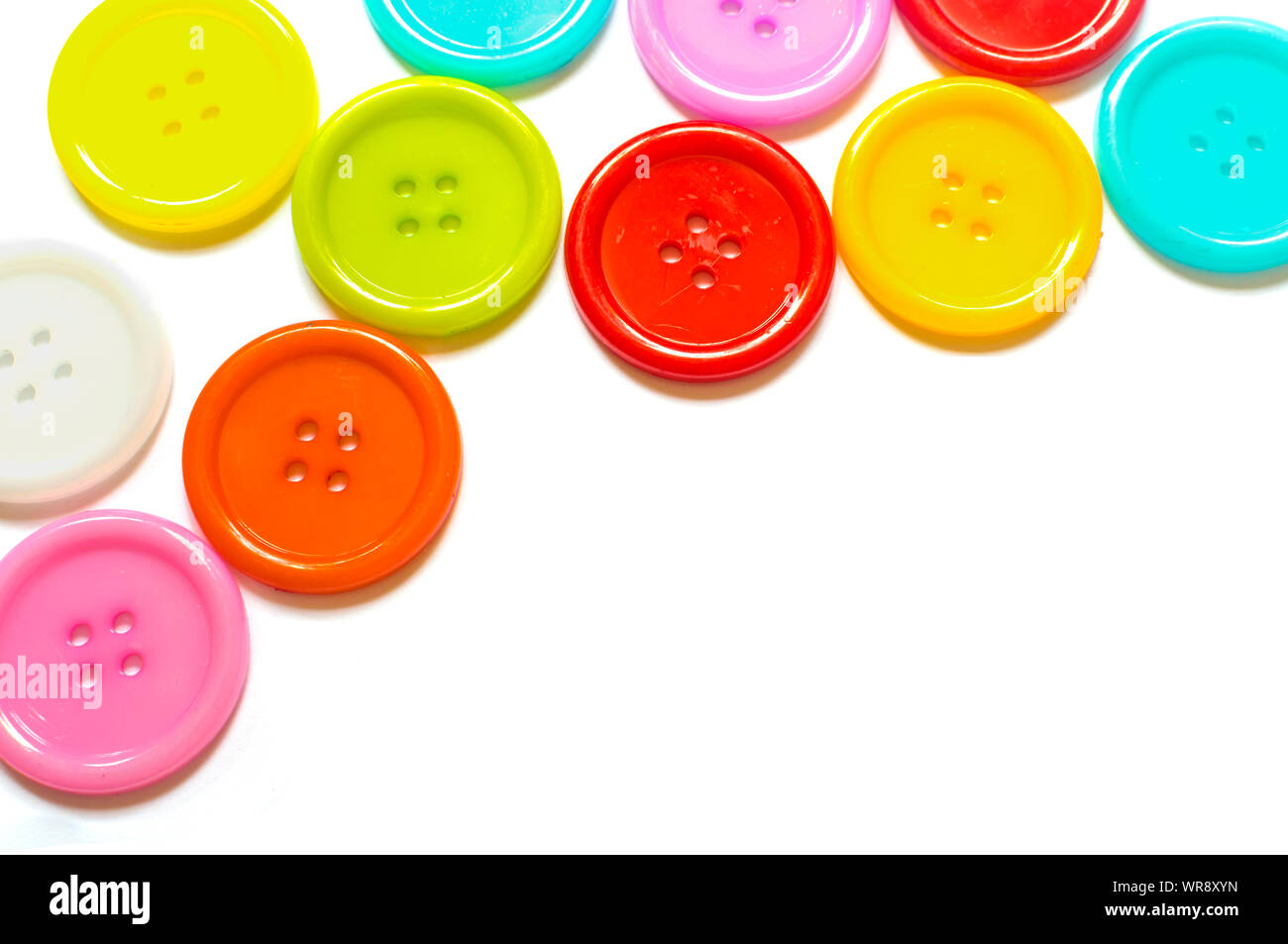 .Various sewing buttons isolated on white background Stock Photo - Alamy