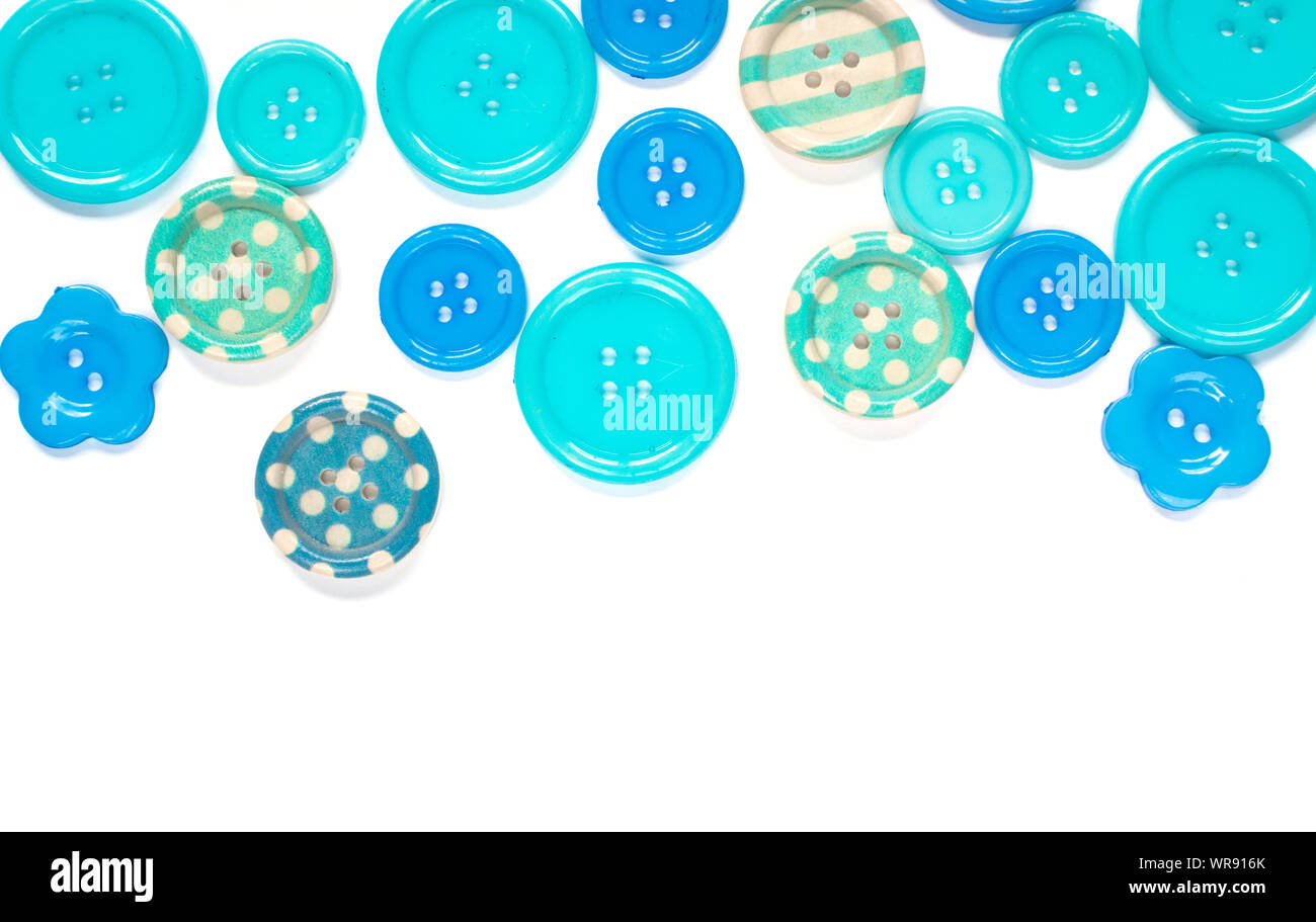 Various blue sewing buttons isolated on white background Stock Photo ...