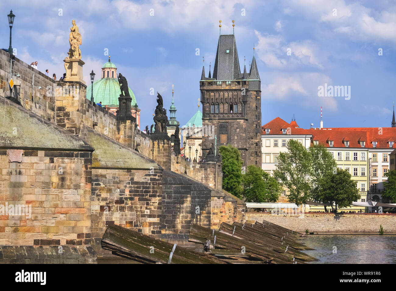 Famous bridge in Prague and old dark medieval castle Stock Photo - Alamy