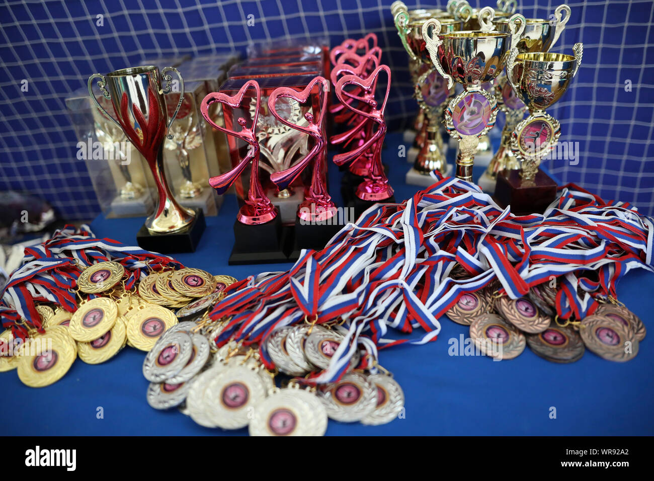 Cups and medals - awards at sports competitions Stock Photo - Alamy