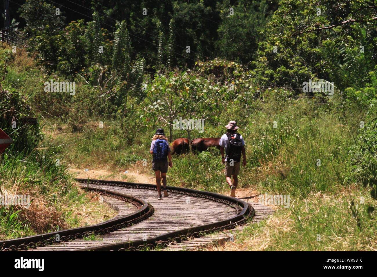 Couple walking on railroad tracks hi-res stock photography and images ...