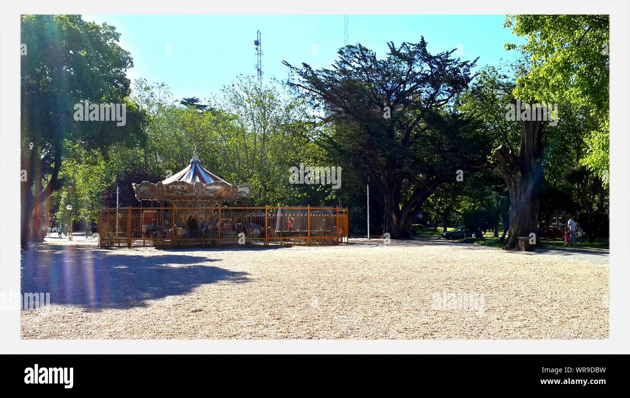 Carousel At Playground Stock Photo - Alamy