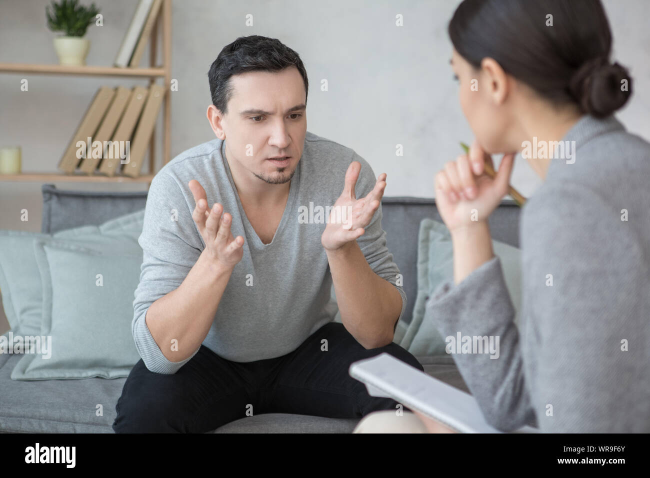 Man visit psychologist meantal health care stress Stock Photo - Alamy