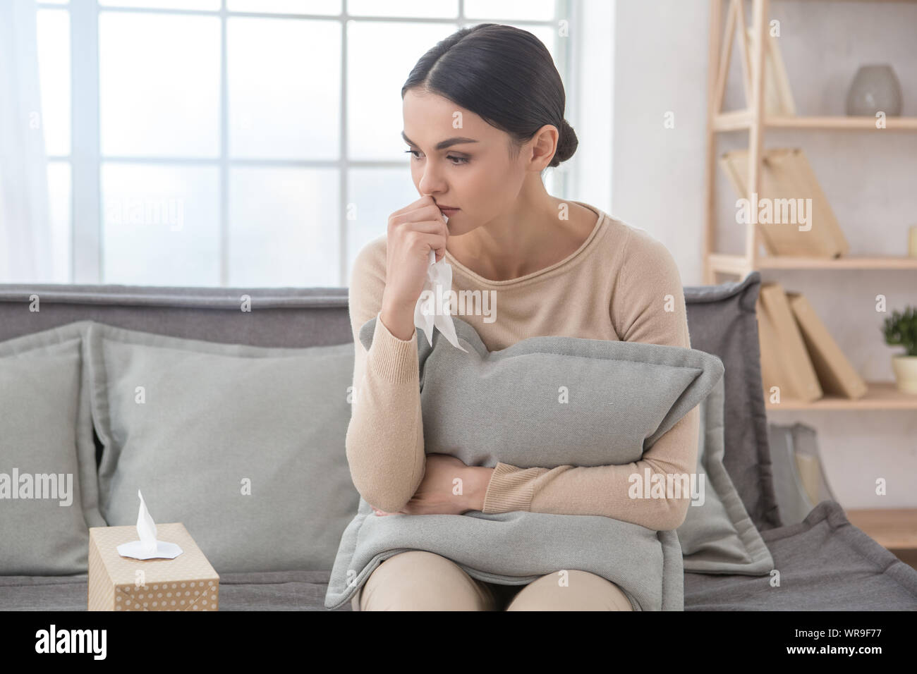 Woman sitting upset psychology session mental health care Stock Photo ...
