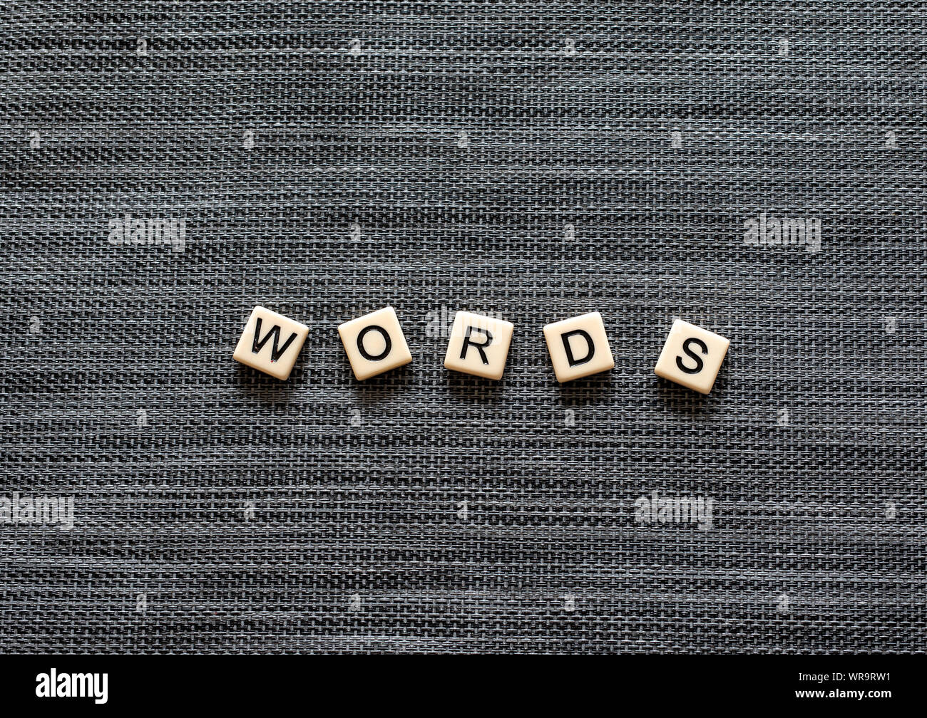 tiles spelling words Stock Photo - Alamy