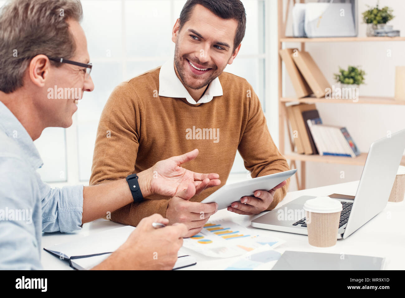 Two business men together in the office Stock Photo - Alamy