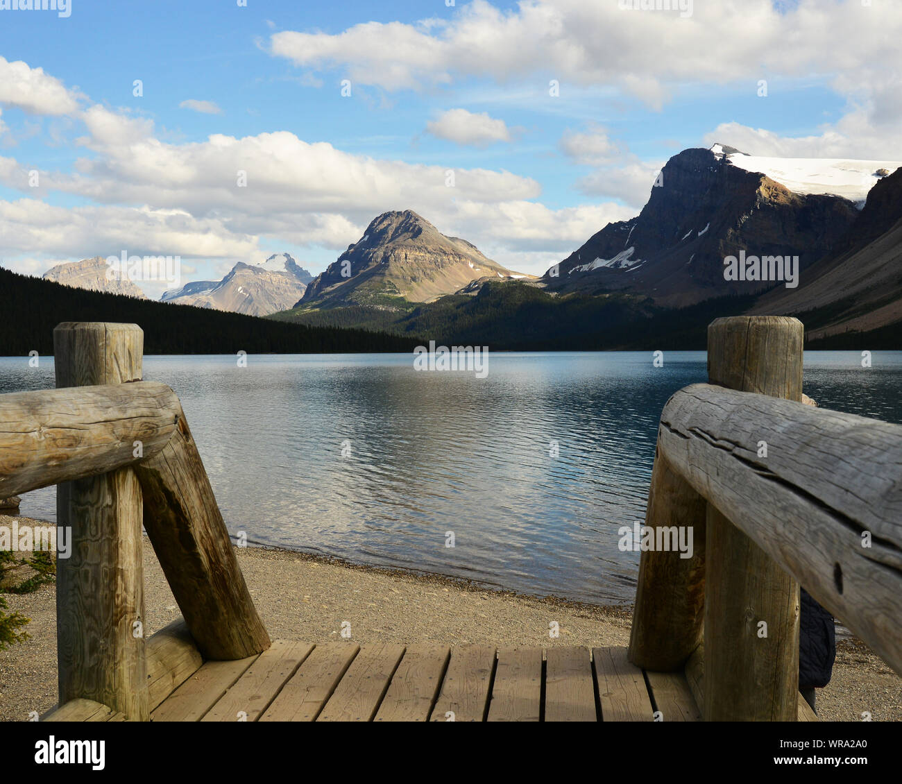 Small wooden bridge looking out over Bow Lake, Banff National Park ...