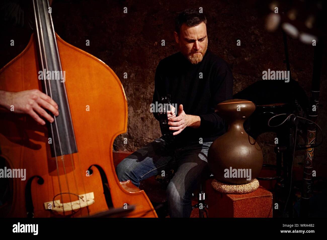 Playing musical instruments hi-res stock photography and images - Alamy