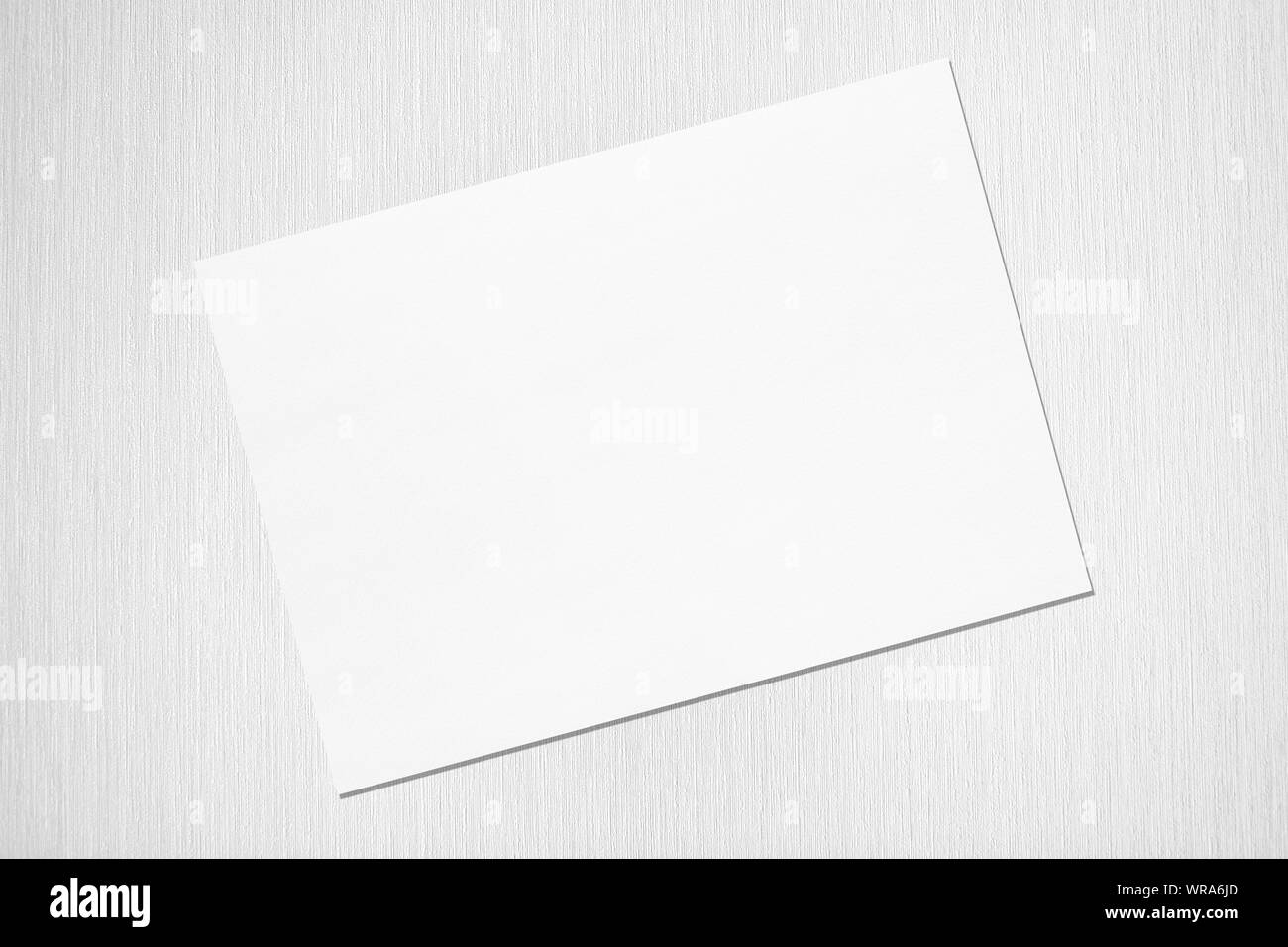 Empty white horizontal rectangle poster mockup with soft shadow lying ...