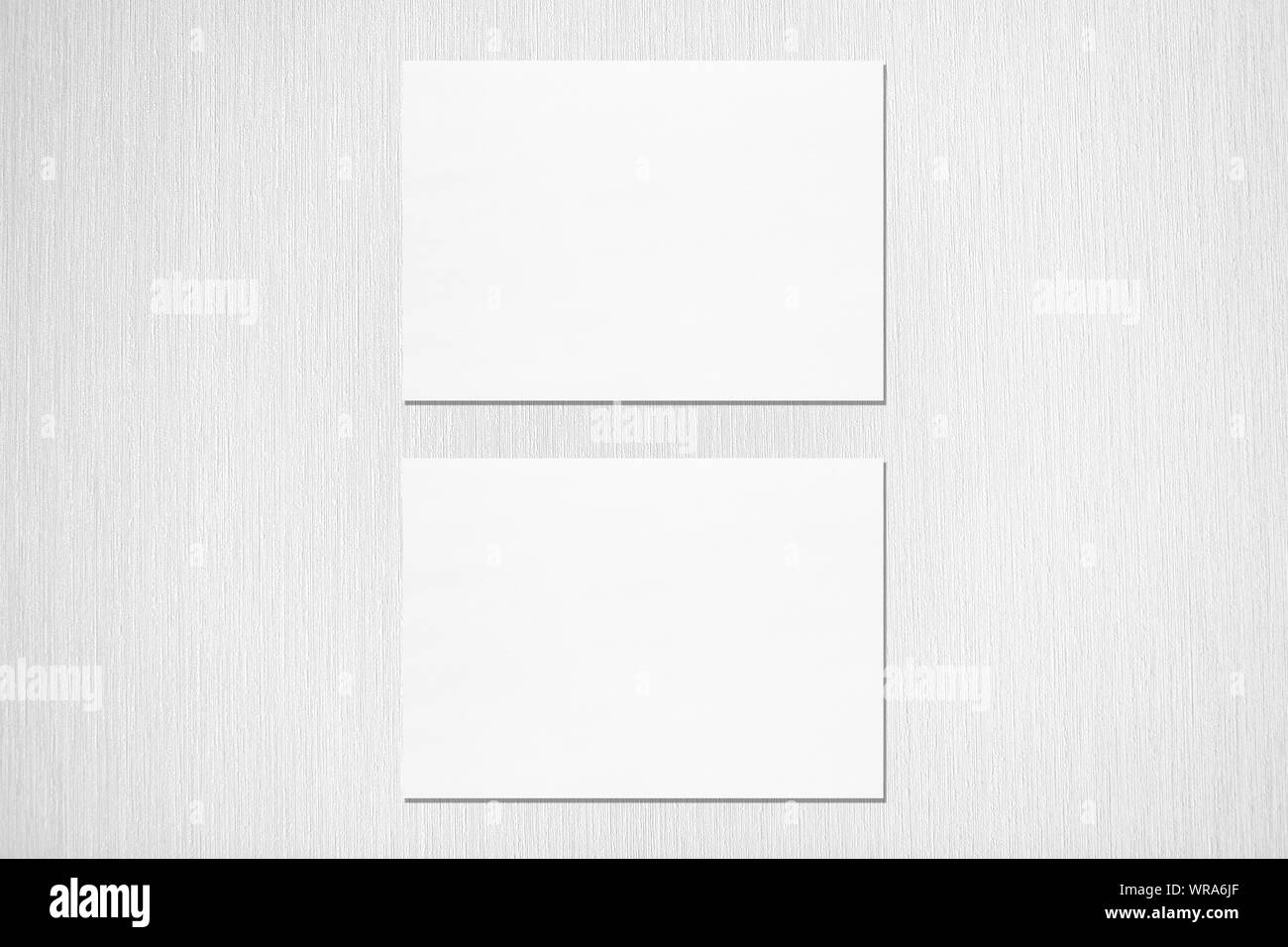 Two empty white horizontal rectangle a5 sized card mockups with soft ...