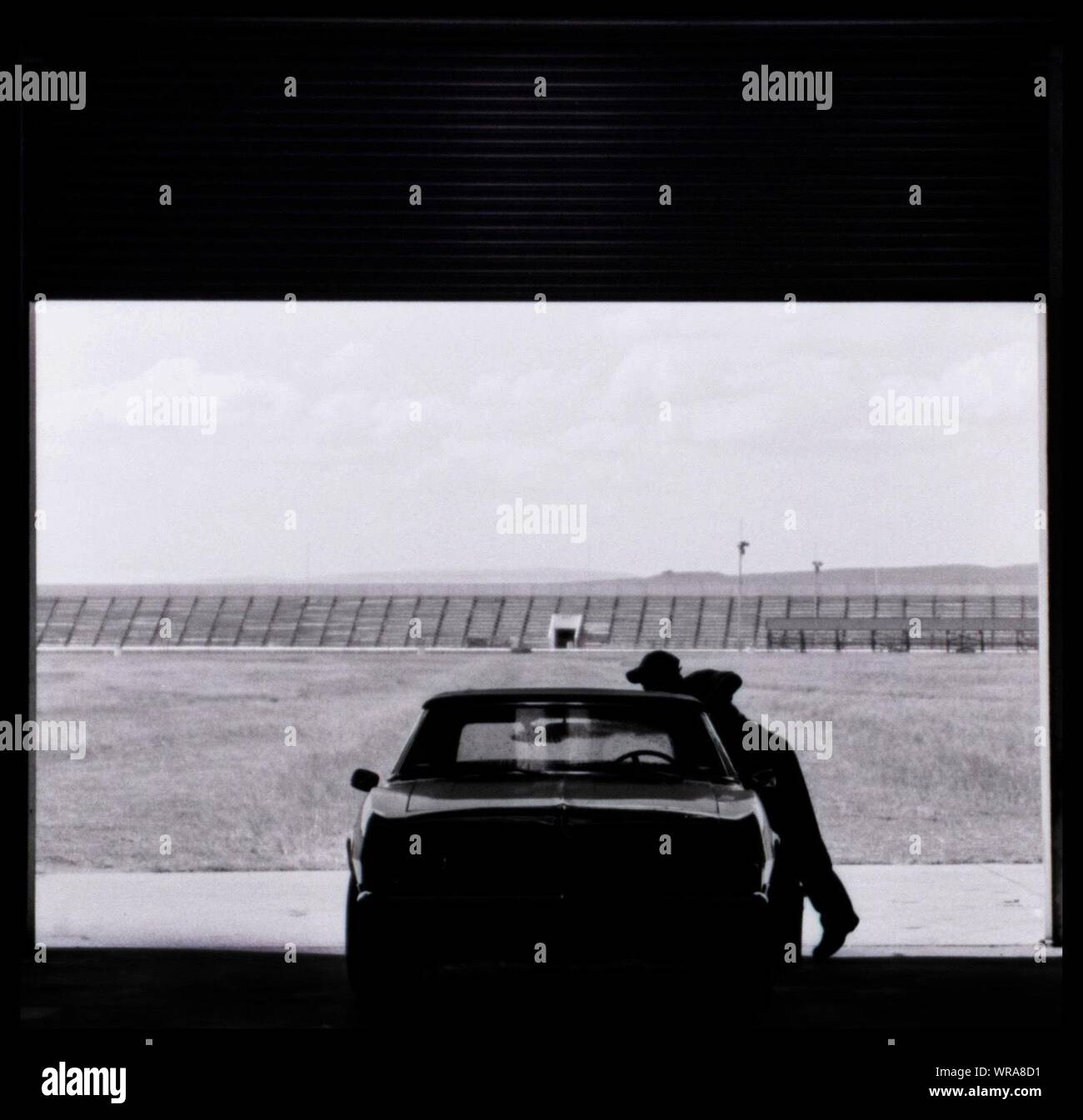 Man leaning car hi-res stock photography and images - Alamy