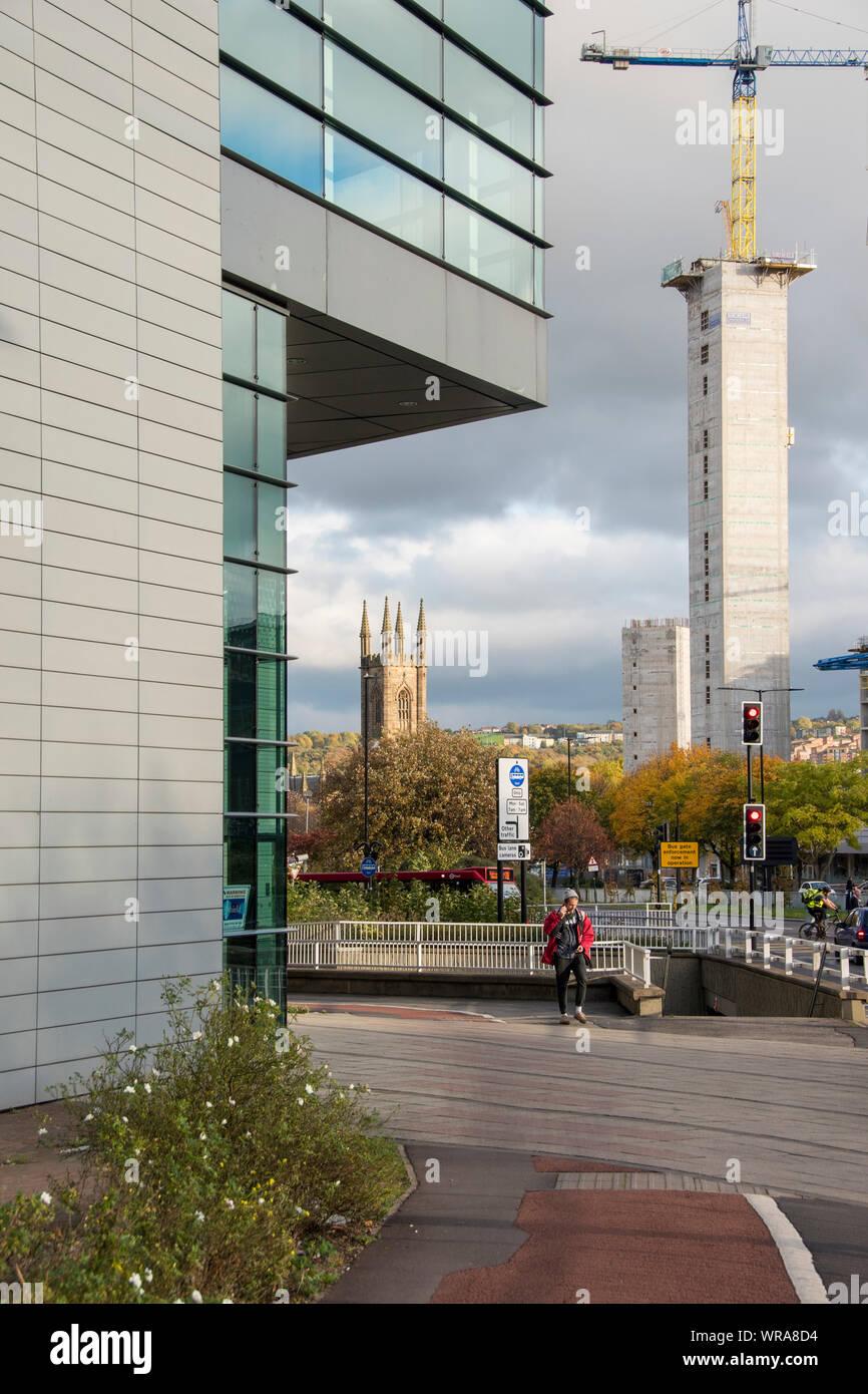 Sheffield, UK - Oct 28 2016: a new tower block construction dwarfs St ...