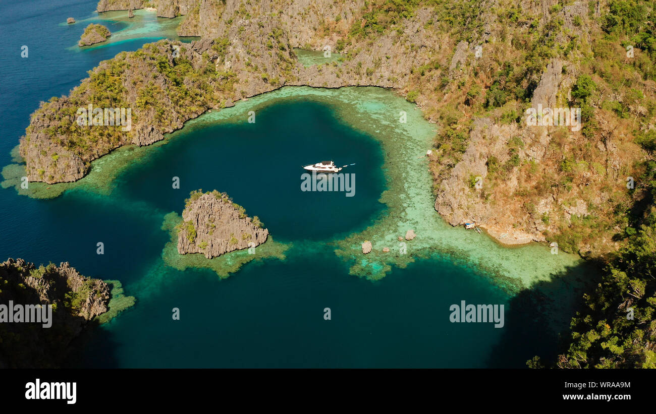 Aerial drone lagoons and coves with blue water among the rocks. lagoon ...