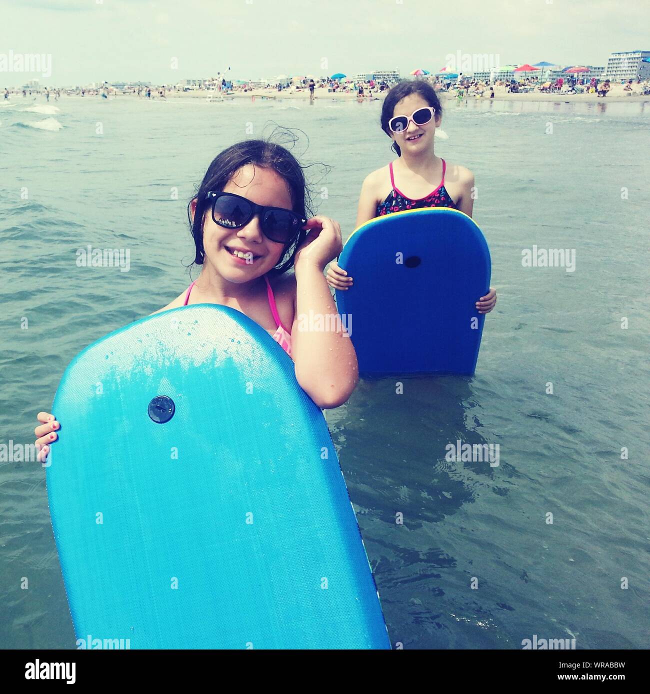Two girls with surfboard hi-res stock photography and images - Alamy
