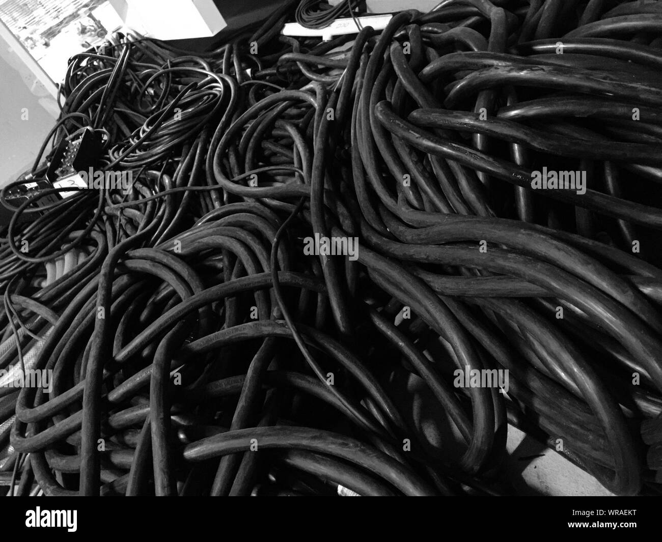 Messy power cable Black and White Stock Photos & Images - Alamy