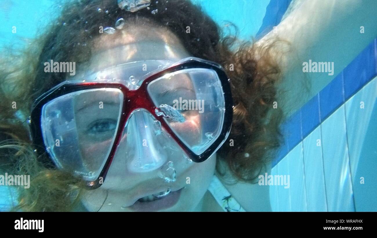 Person underwater swimming pool hi-res stock photography and images - Alamy