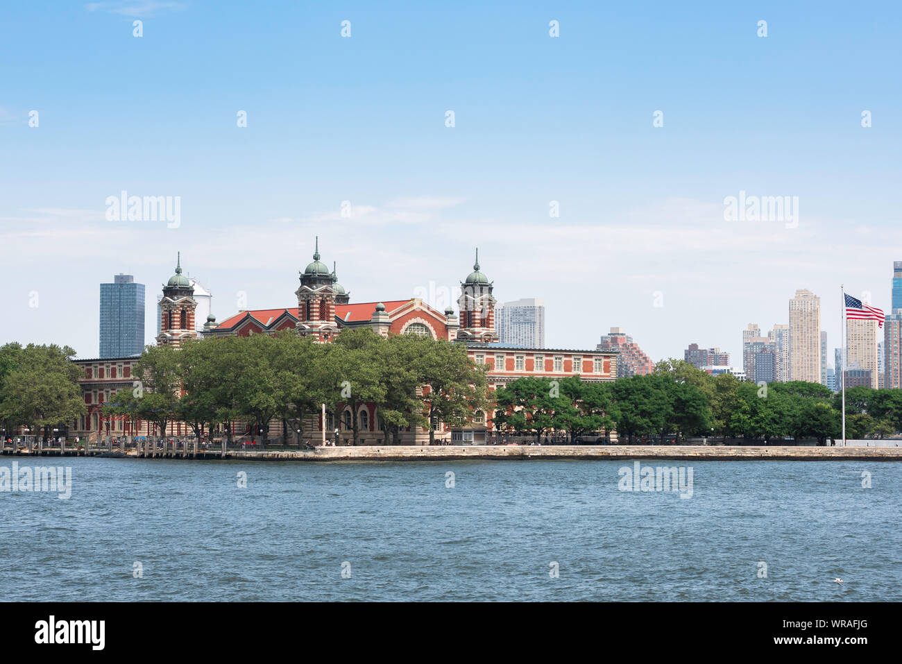 Ellis Island, view across New York harbor of the Ellis Island building ...