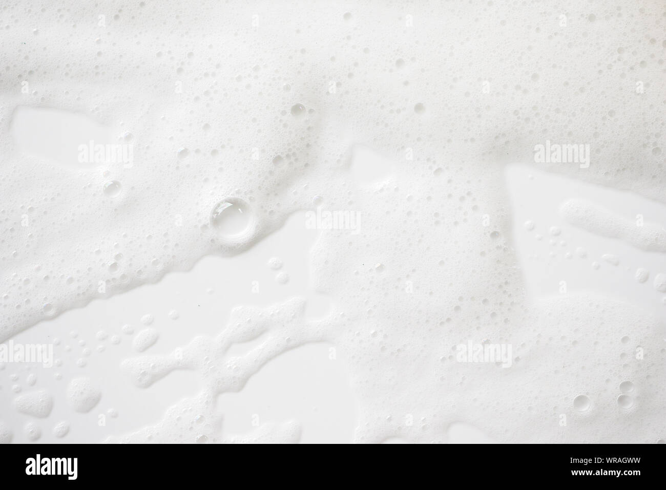 Abstract background white soapy foam texture. Shampoo foam with bubbles ...