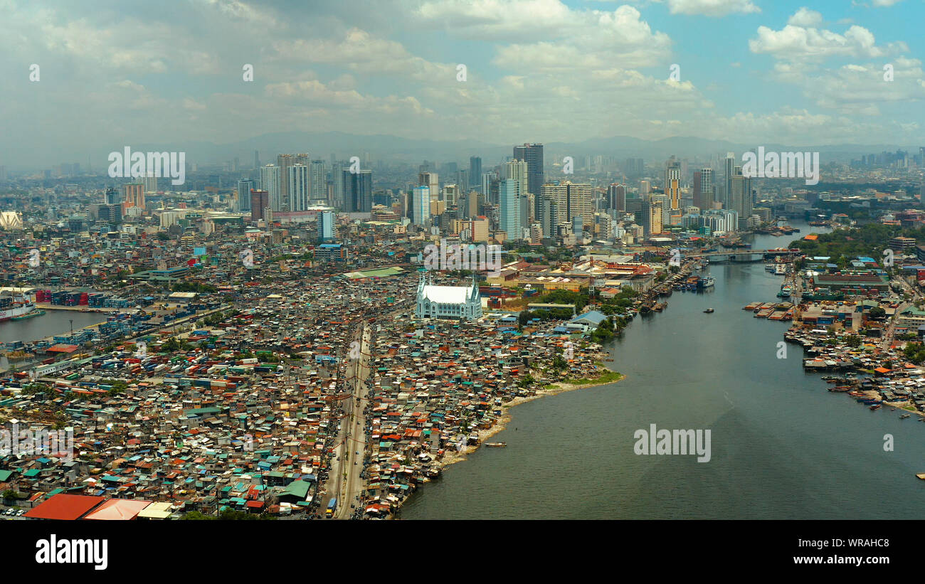 Manila city with skyscrapers, modern buildings and Makati business ...