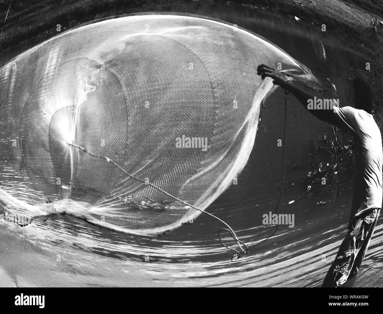 People catching fish hi-res stock photography and images - Alamy