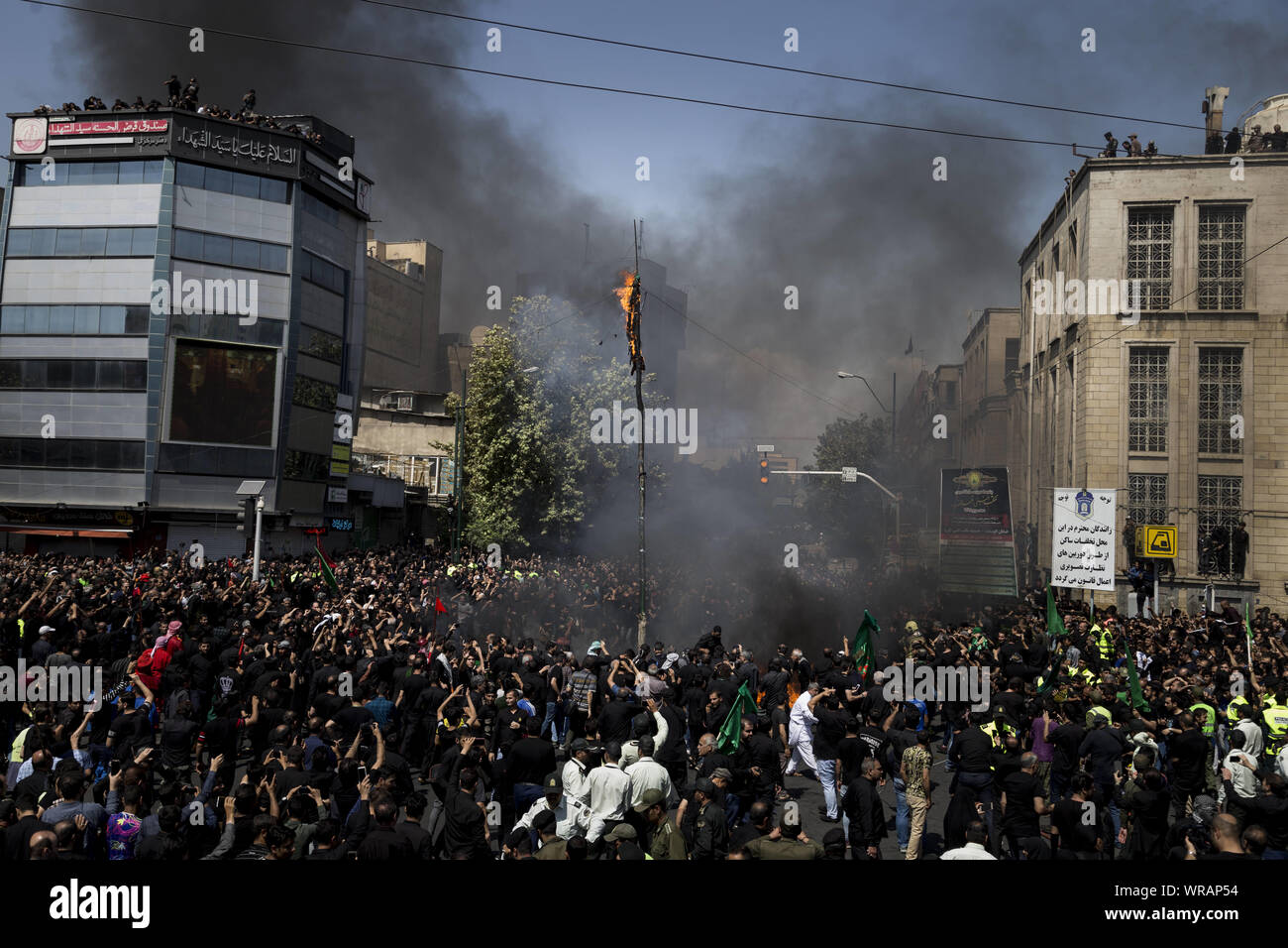 Tehran, Tehran, Iran. 10th Sep, 2019. Iranians burn a tent as they ...