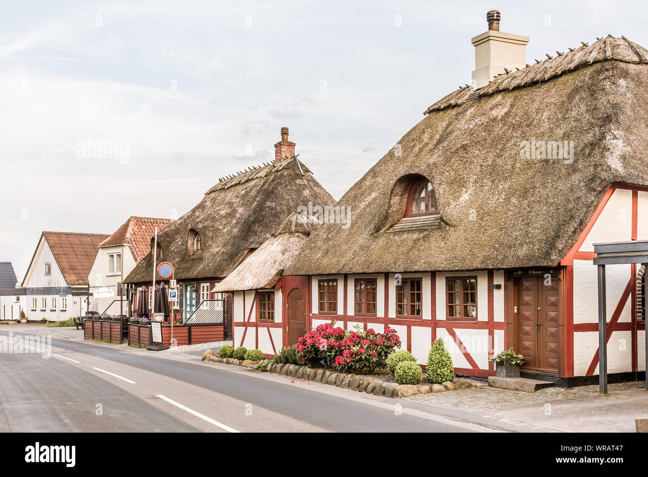 Old thatched half-timbered houses along the street to Thoro in ...