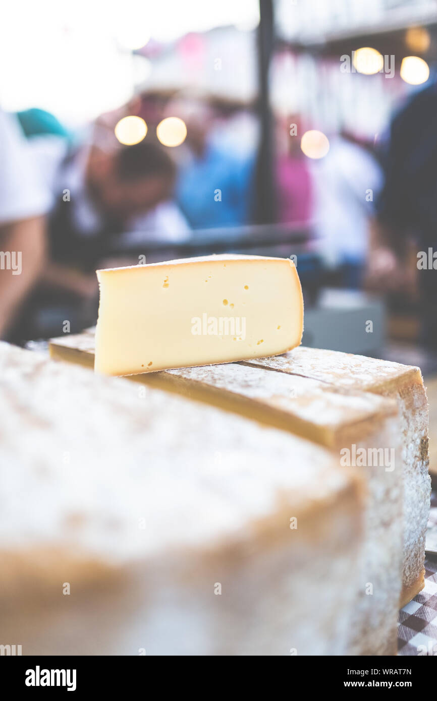 Handmade local traditional cheese on a market stall Stock Photo - Alamy