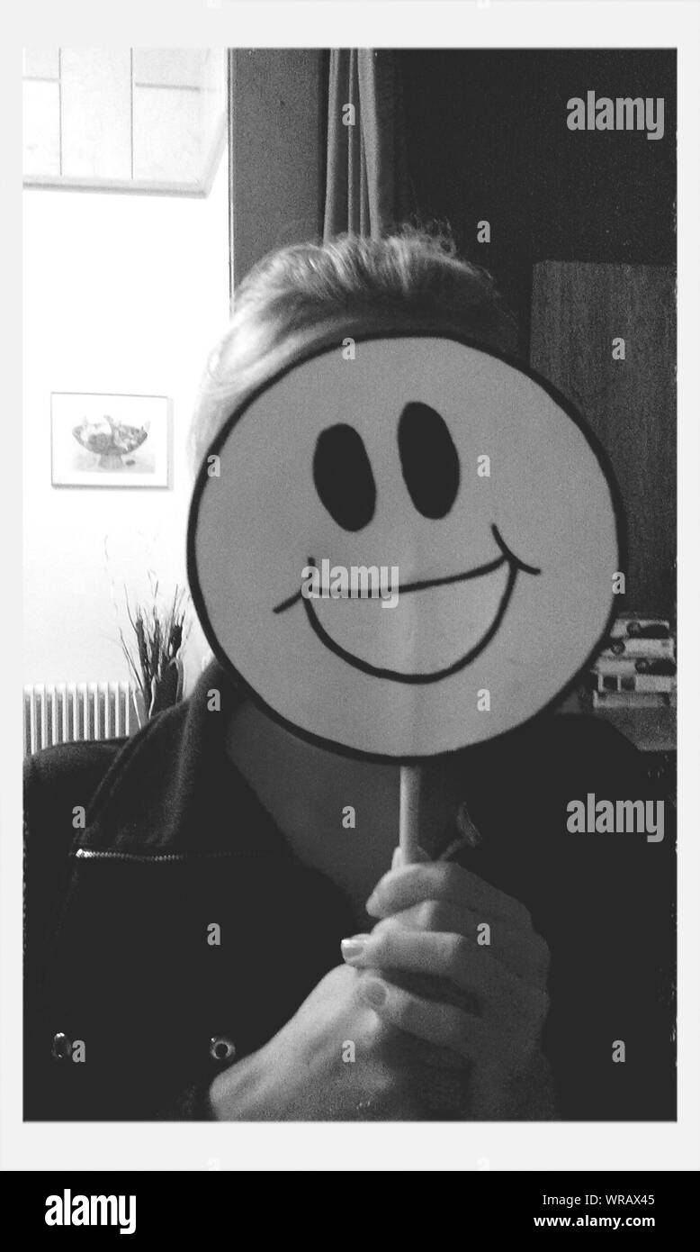Smiley face sign woman hi-res stock photography and images - Alamy