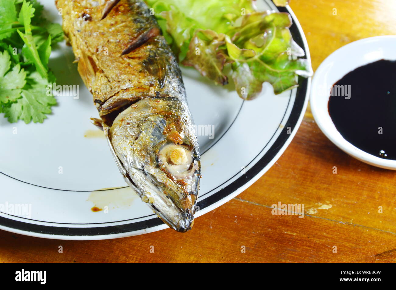 fried Saba fish and vegetable with sweet black soy sauce Stock Photo ...