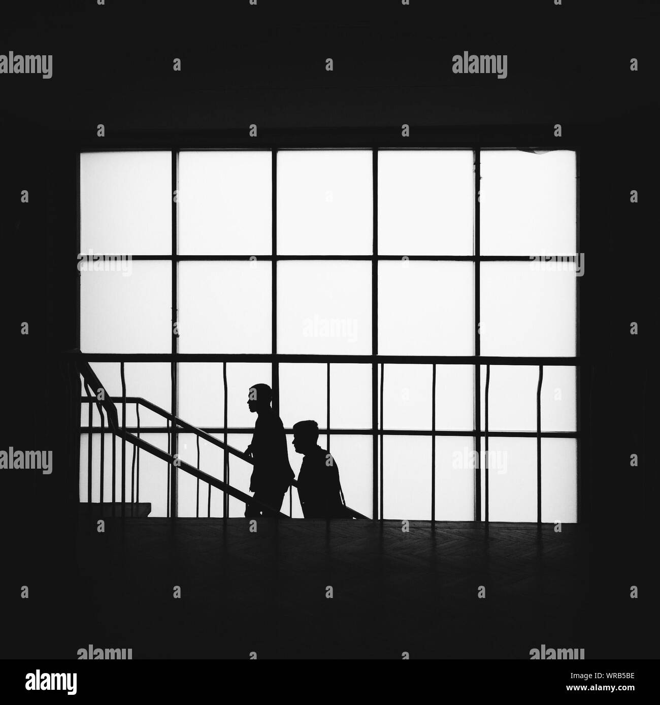 Standing in window hi-res stock photography and images - Alamy