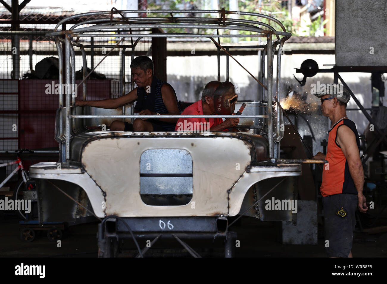 Manila, Philippines. 31st July, 2019. A jeepney is built in a company ...