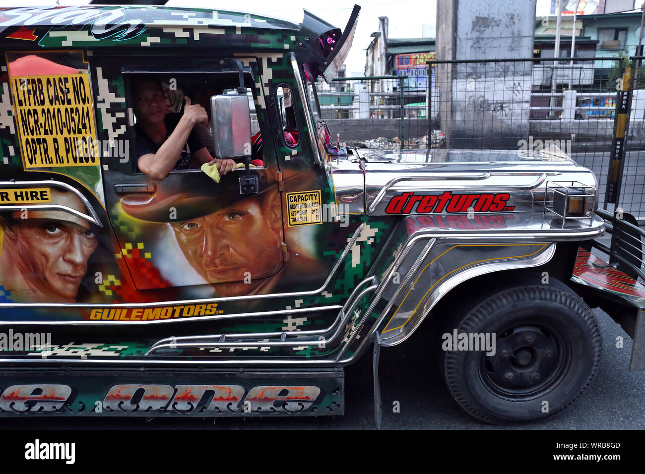 Manila, Philippines. 31st July, 2019. A jeepney drives through the ...