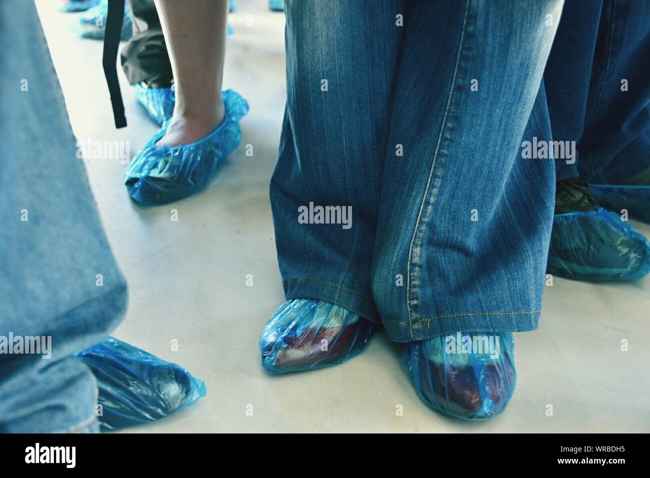 Plastic covered shoes hi-res stock photography and images - Alamy