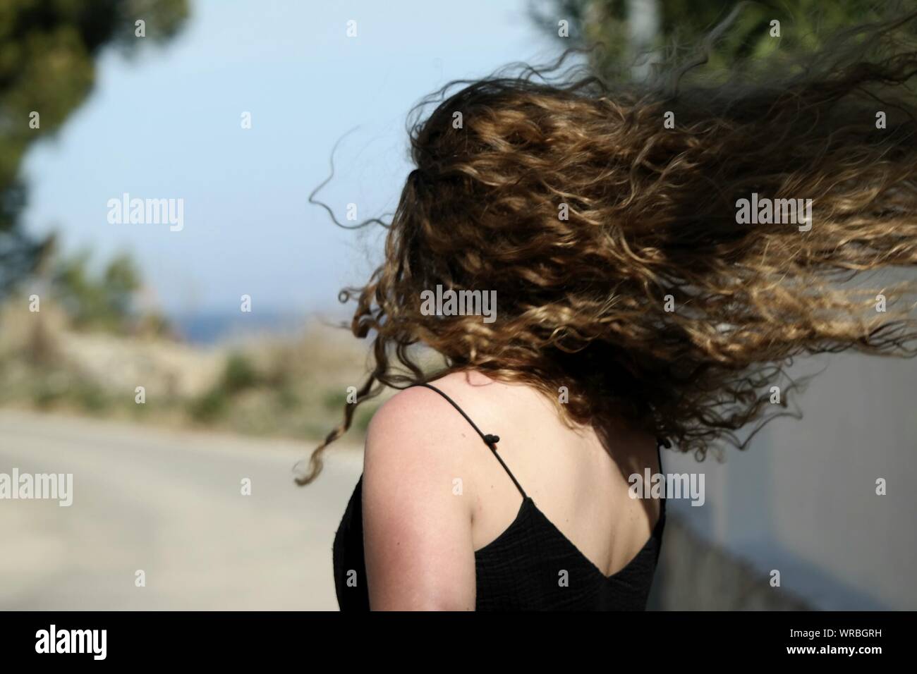 Women rear view wind hi-res stock photography and images - Alamy