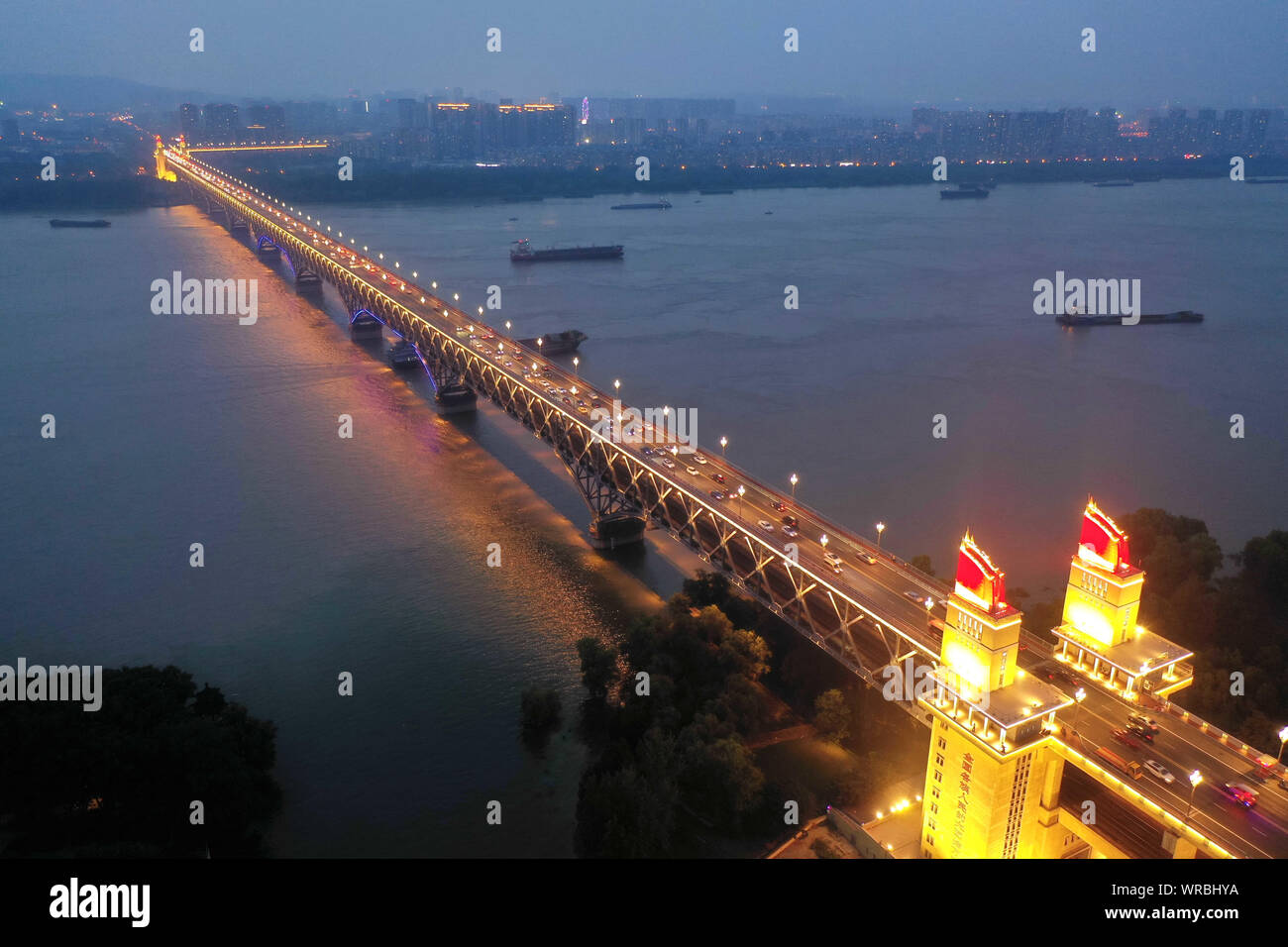 An aerial view at night of the Nanjing Yangtze River Bridge over the ...
