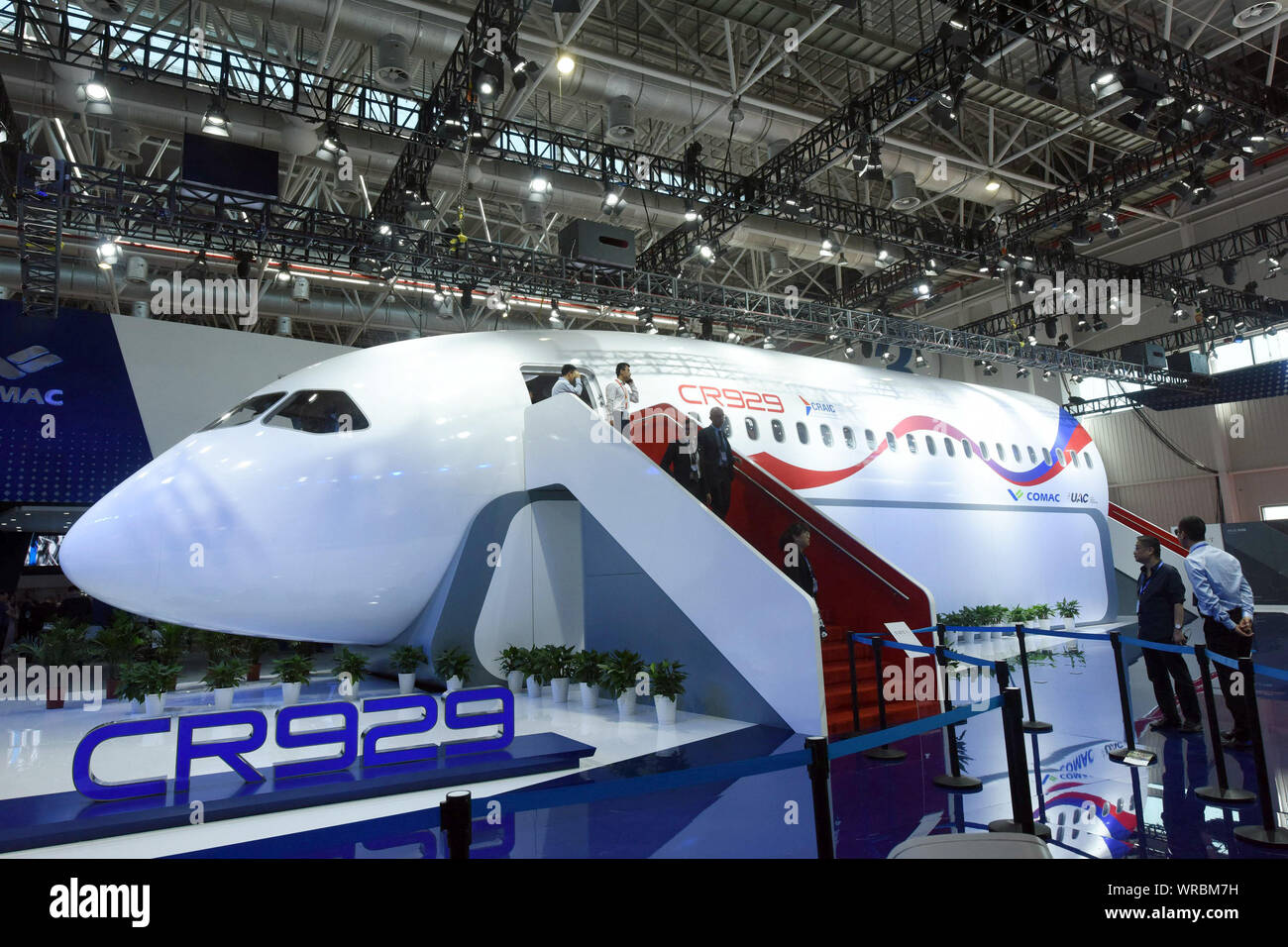 **FILE**Visitors view a mockup of the CR929 long-range wide-body aircraft on display during the ...