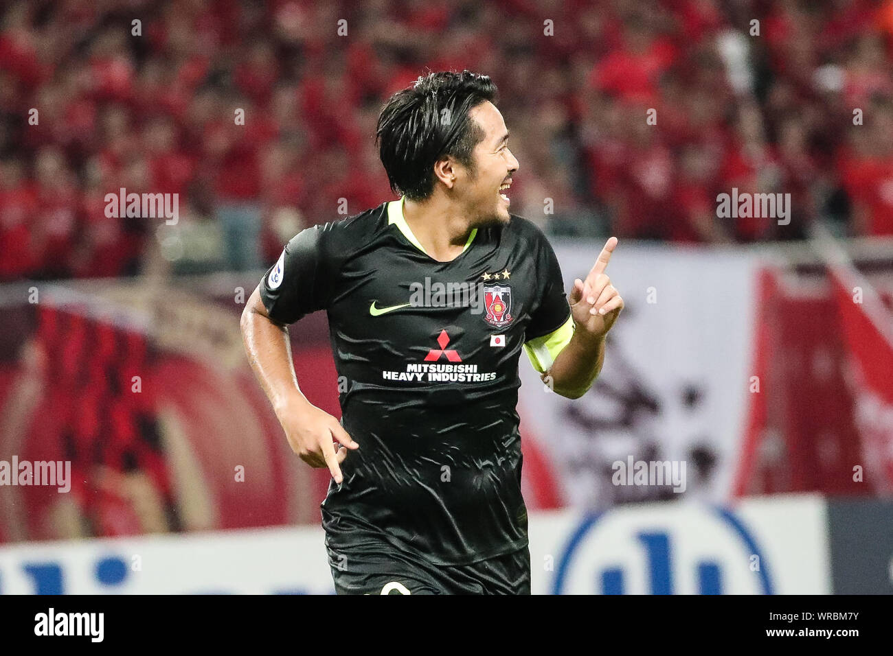 Shinzo Koroki of Urawa Red Diamonds celebrates after scoring Urawa's ...