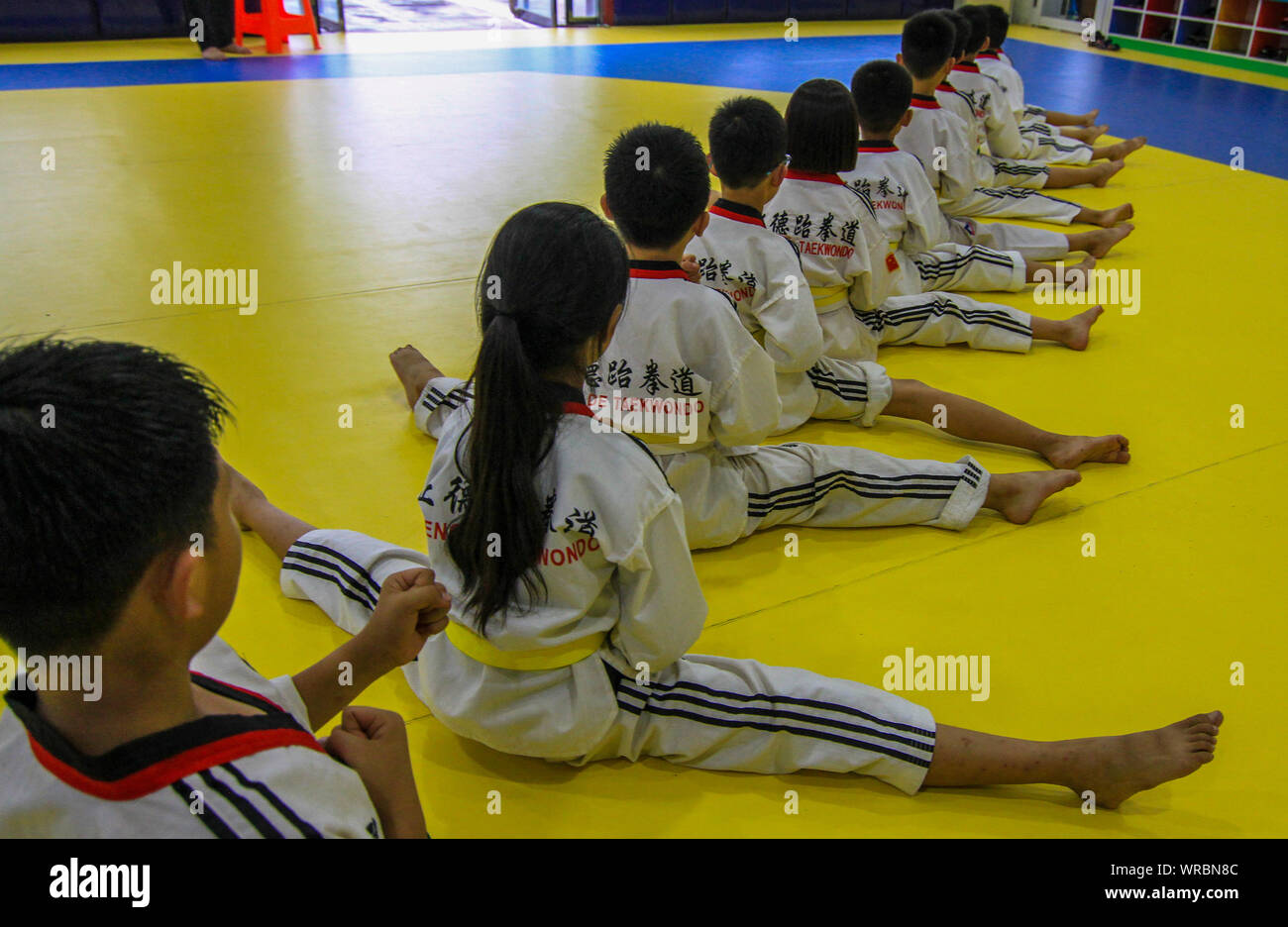 Young Chinese children practise taekwondo during a training session at ...