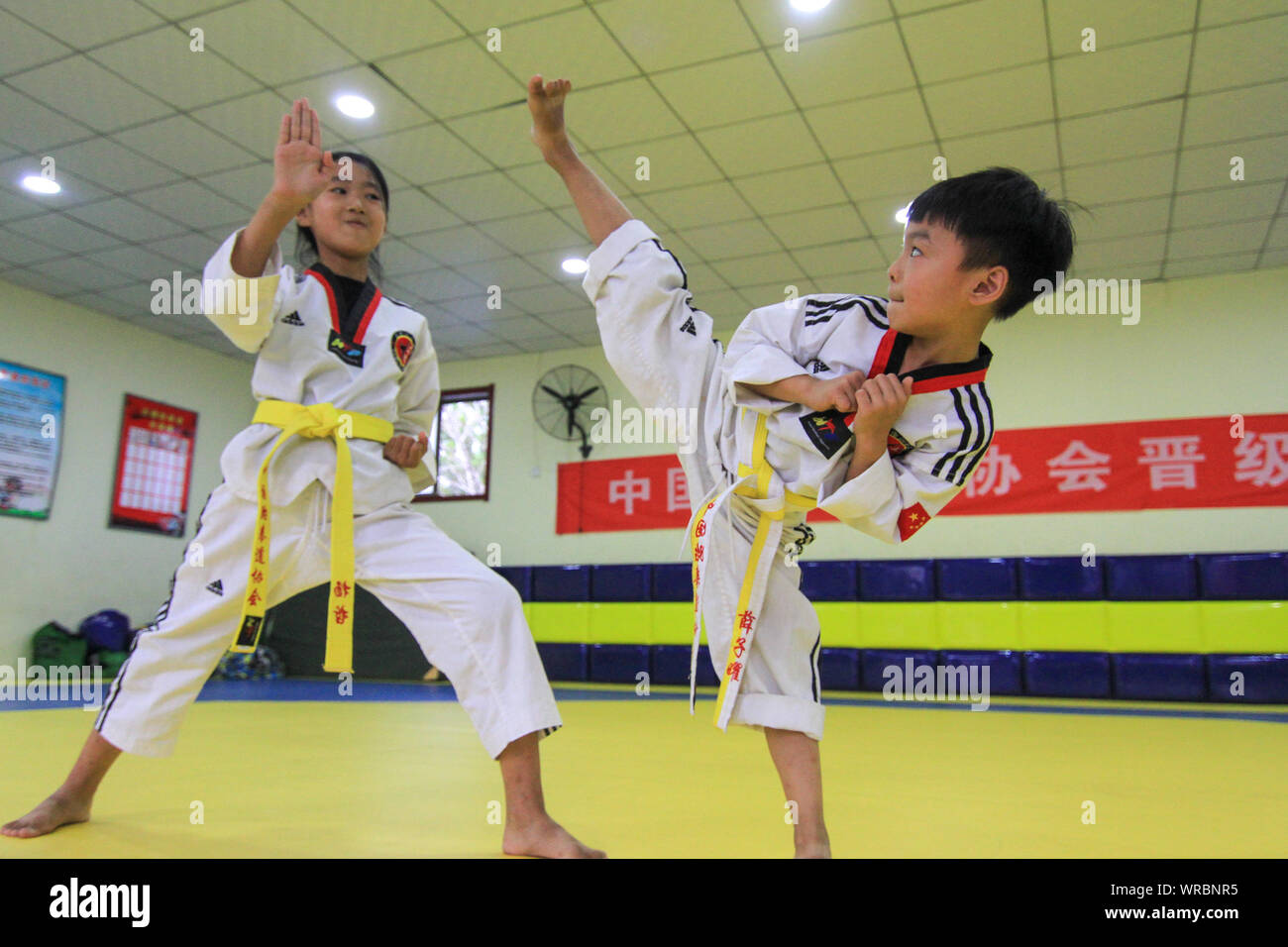 Young Chinese children practise taekwondo during a training session at a school during the ...