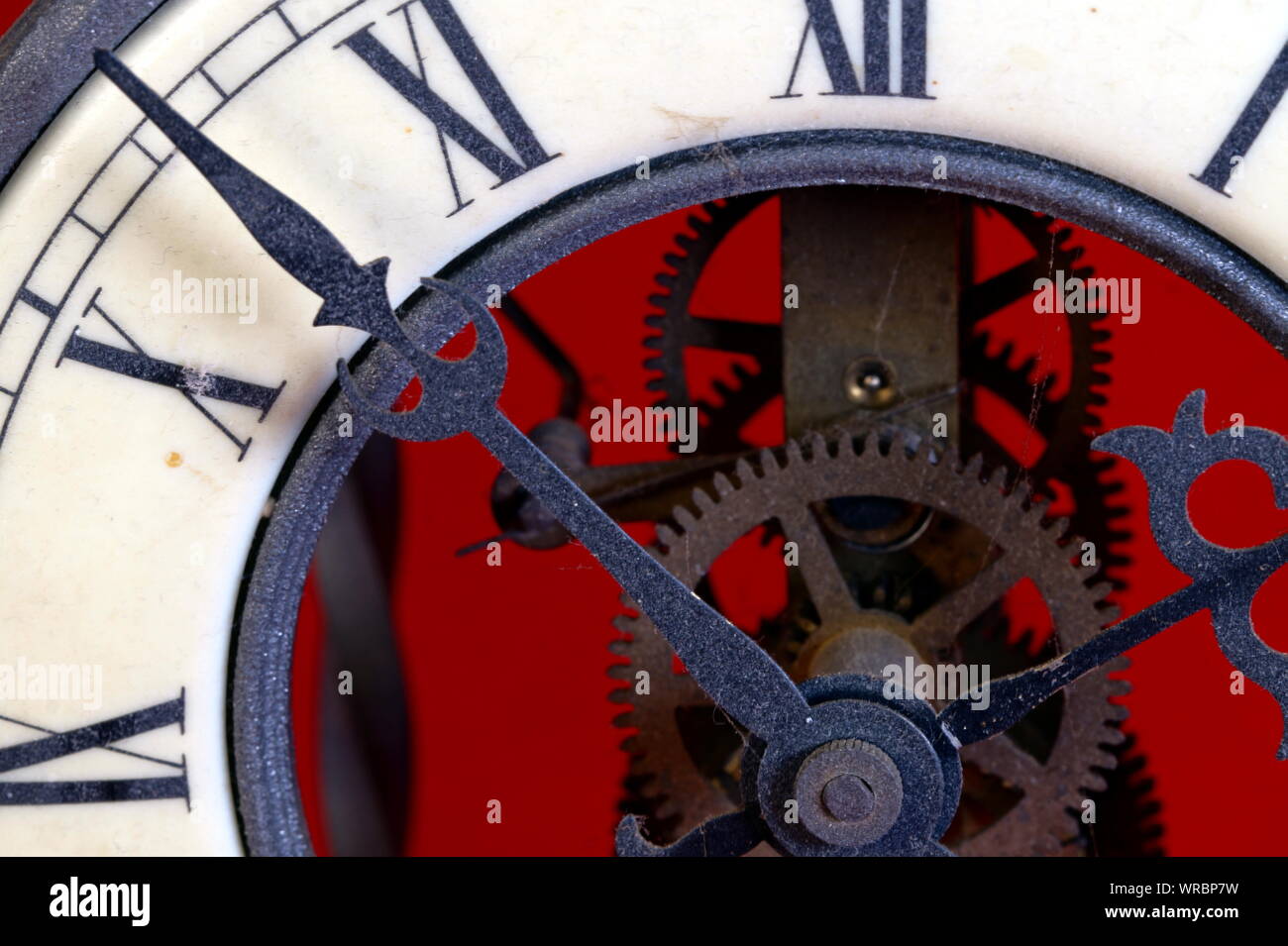 old metal dusty mechanical clock with moving gears and screws. Brass ...