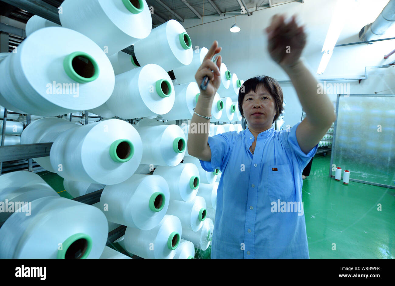 Female chinese worker hi-res stock photography and images - Alamy