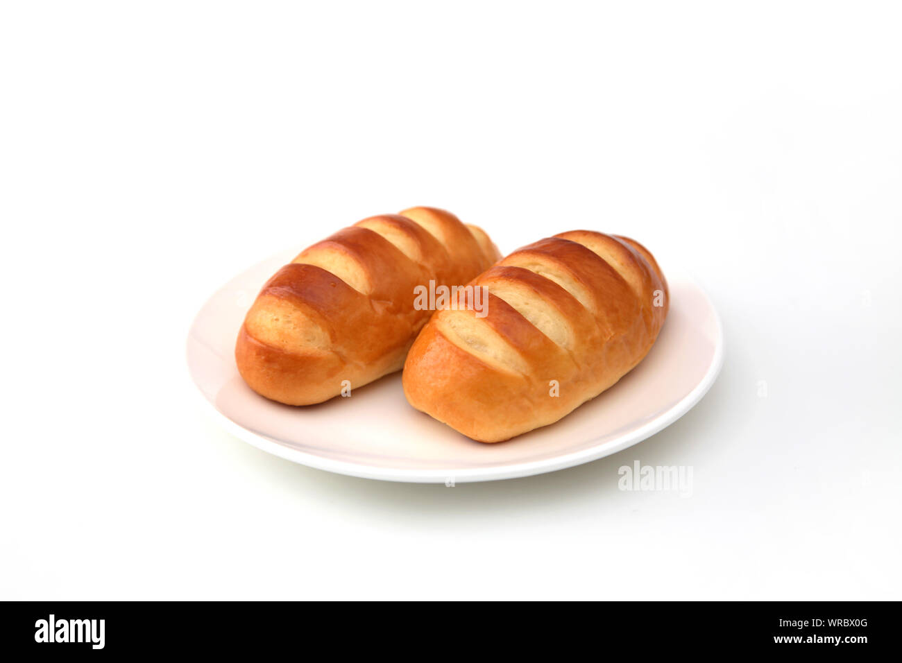 butter bread roll closeup isolated on white background Stock Photo - Alamy