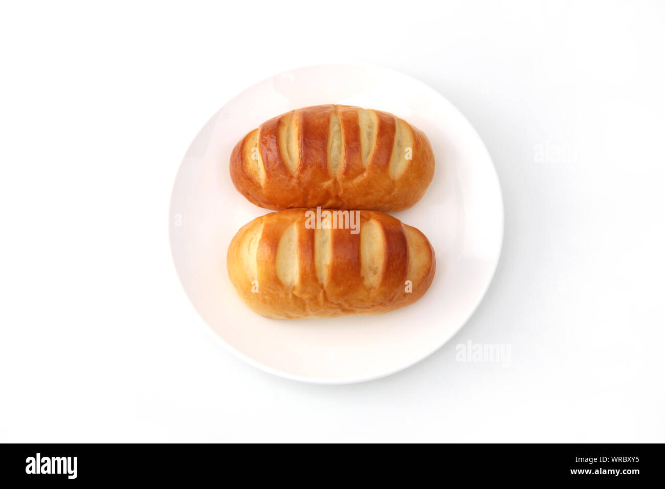 butter bread roll closeup isolated on white background Stock Photo - Alamy